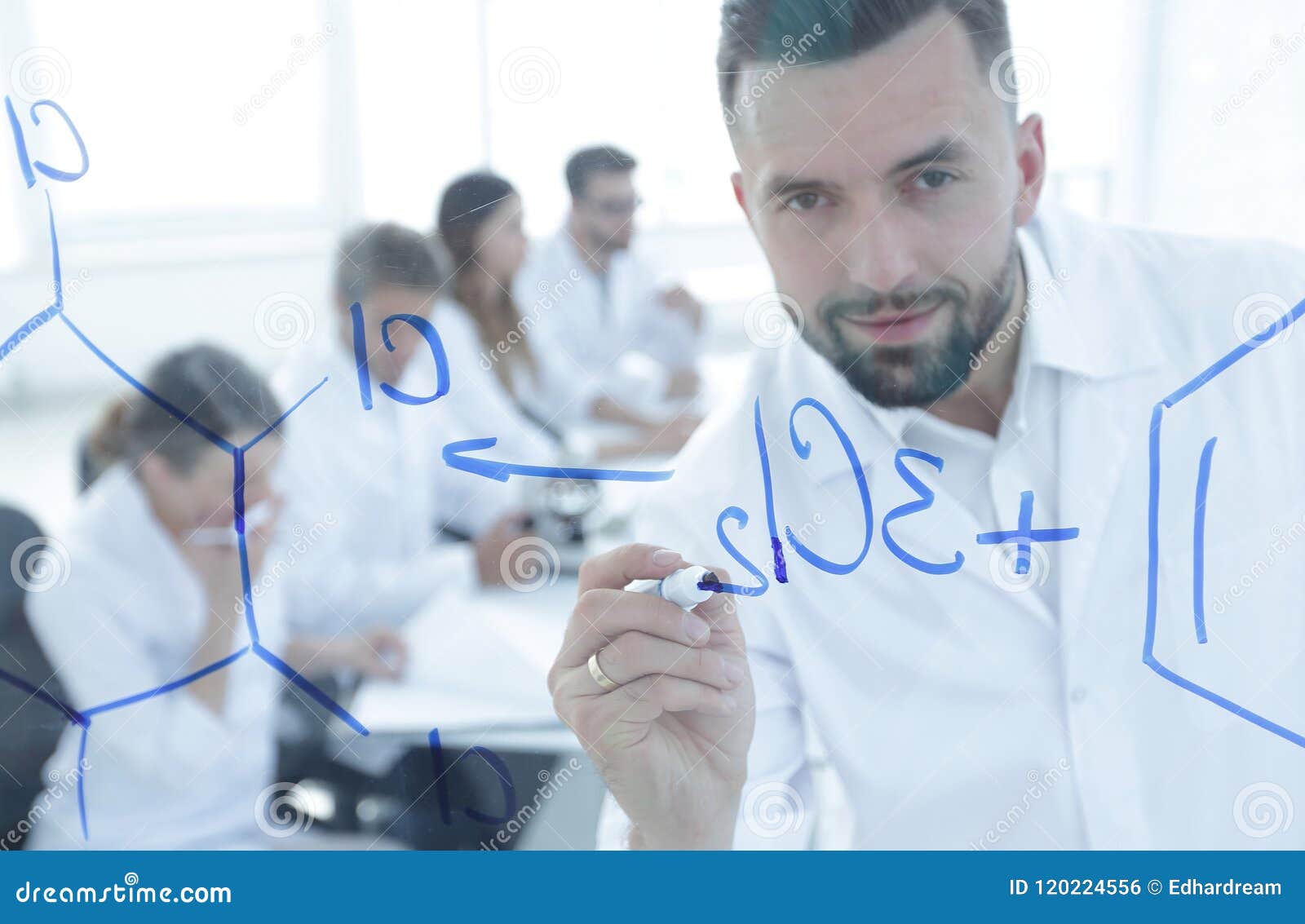 Closeup of a Serious Scientist Working with Formulas Stock Photo ...