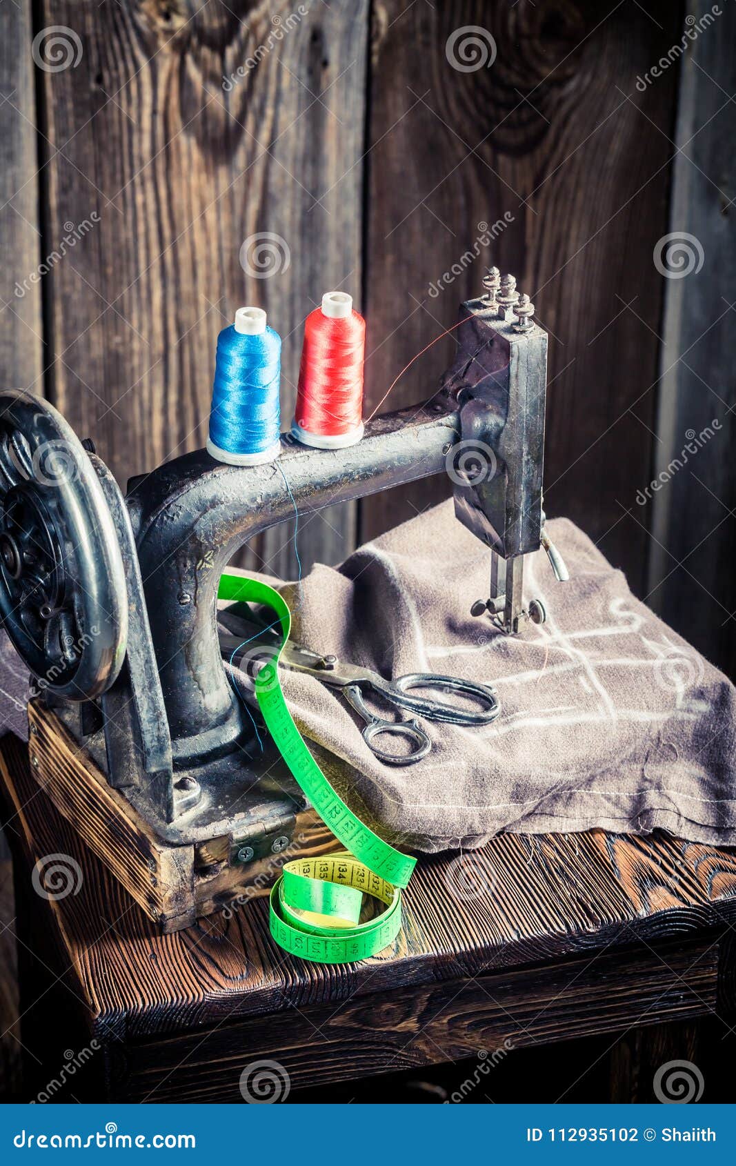 Closeup of Sewing Machine with Scissors, Threads and Cloth Stock Photo ...