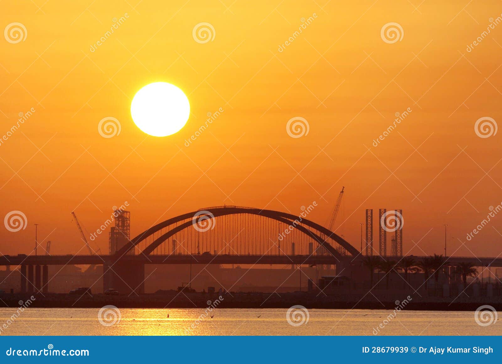 Closeup of the Shaikh Khalifa Bridge & Sun at Sunrise, Bahrain Stock ...