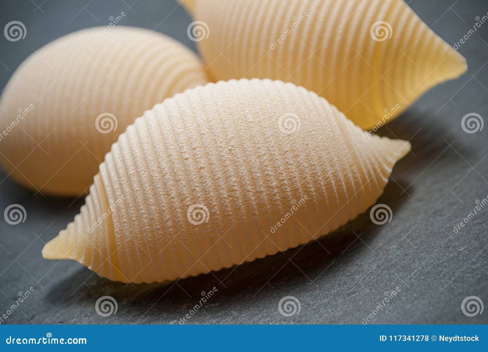 Shaped Seashell Pasta on Chalkboard Background Stock Photo - Image of ...