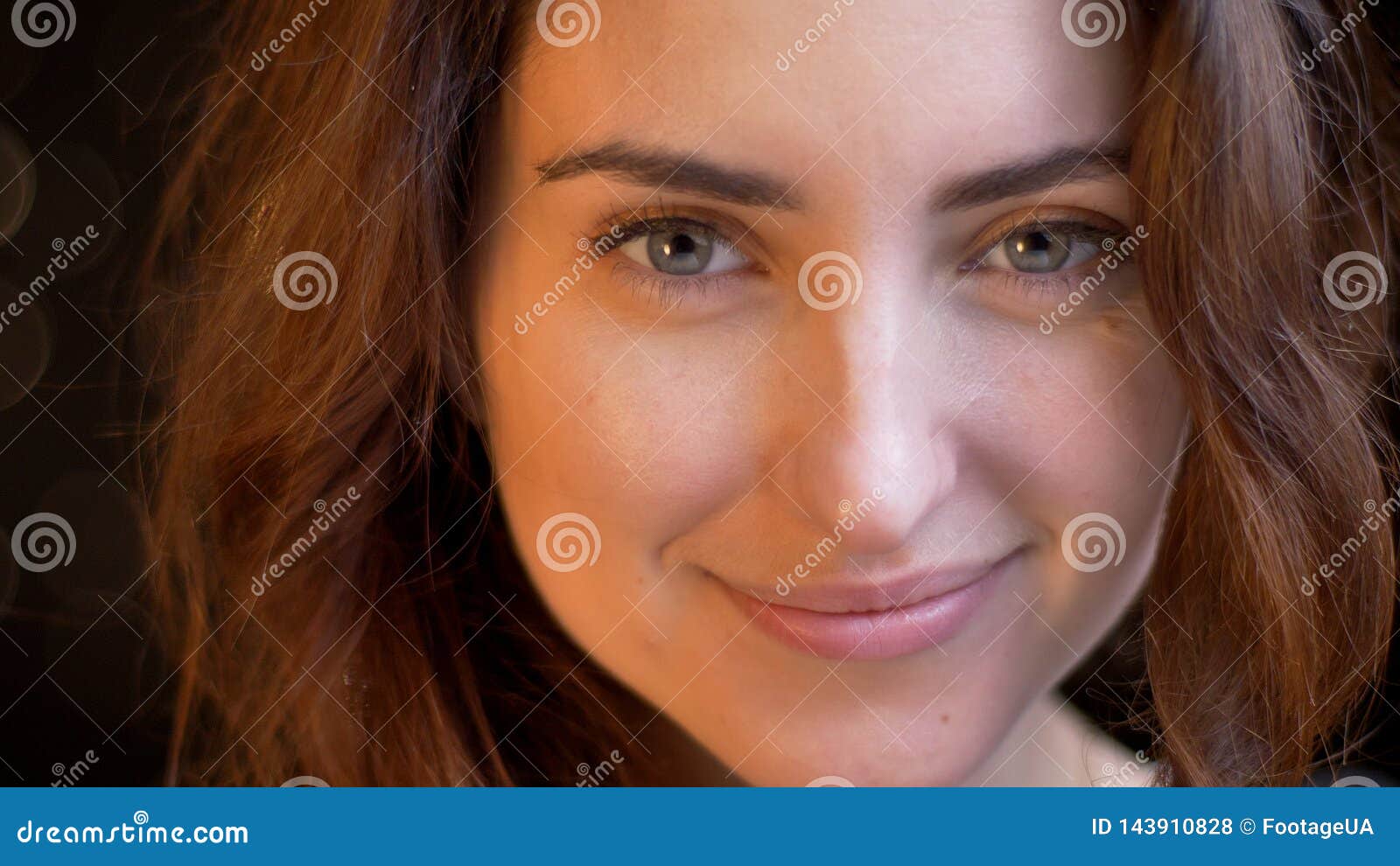 Closeup Shoot Of Young Attractive Caucasian Female Face Smiling And