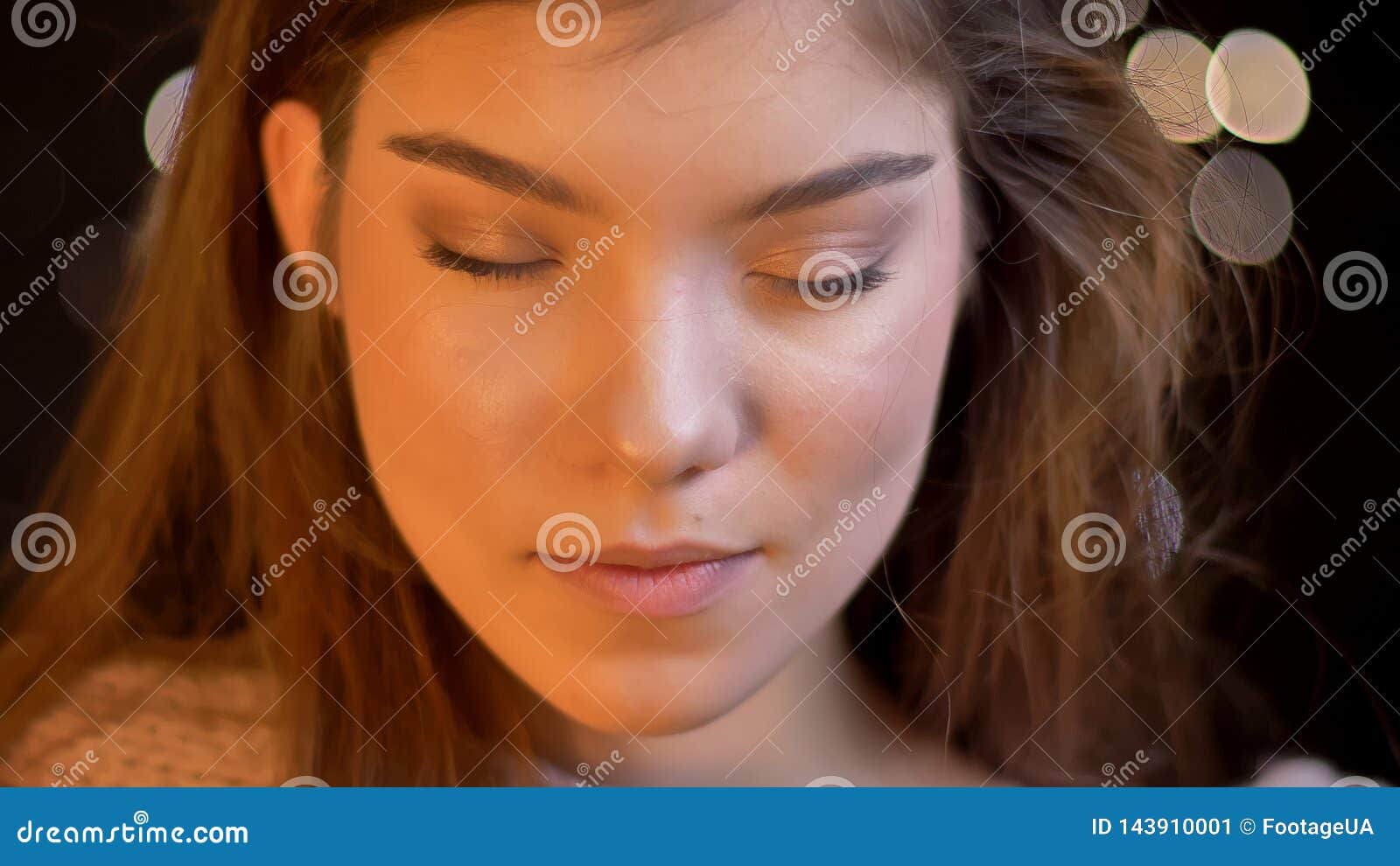 Closeup Shoot Of Young Attractive Caucasian Female With Her Eyes Closed