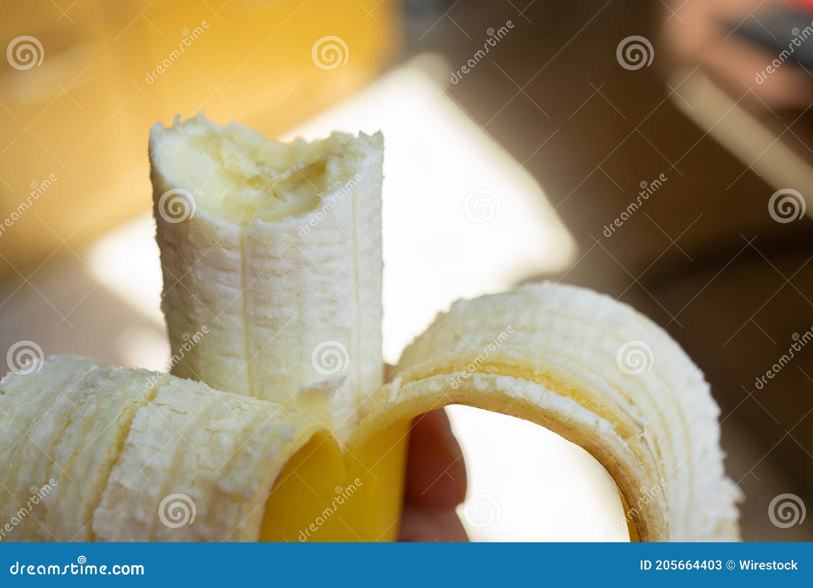 Closeup Shot of a Bitten Banana Stock Image - Image of snack, bitten ...