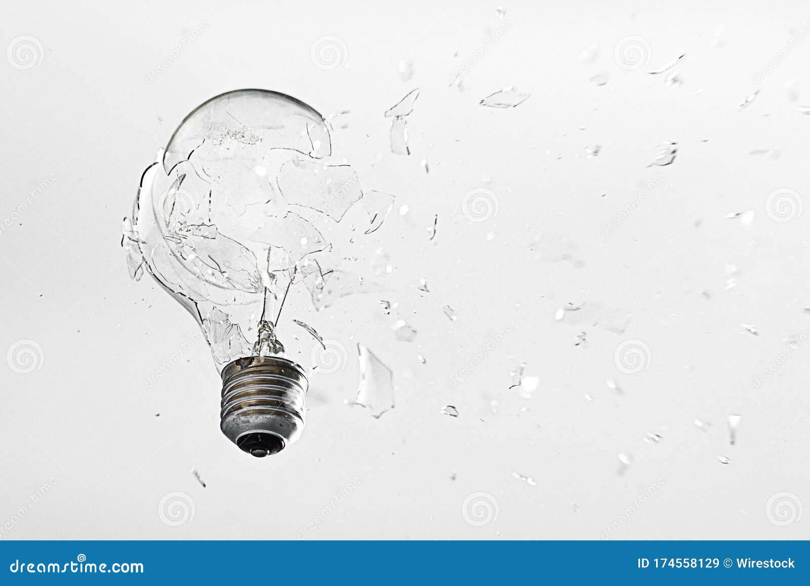 Closeup Shot of a Broken Glass Light Bulb on a White Background Stock ...