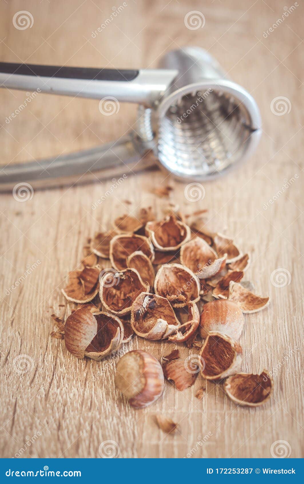 Closeup Shot of Broken Hazelnut Nut Shells on a Table with a Nut ...
