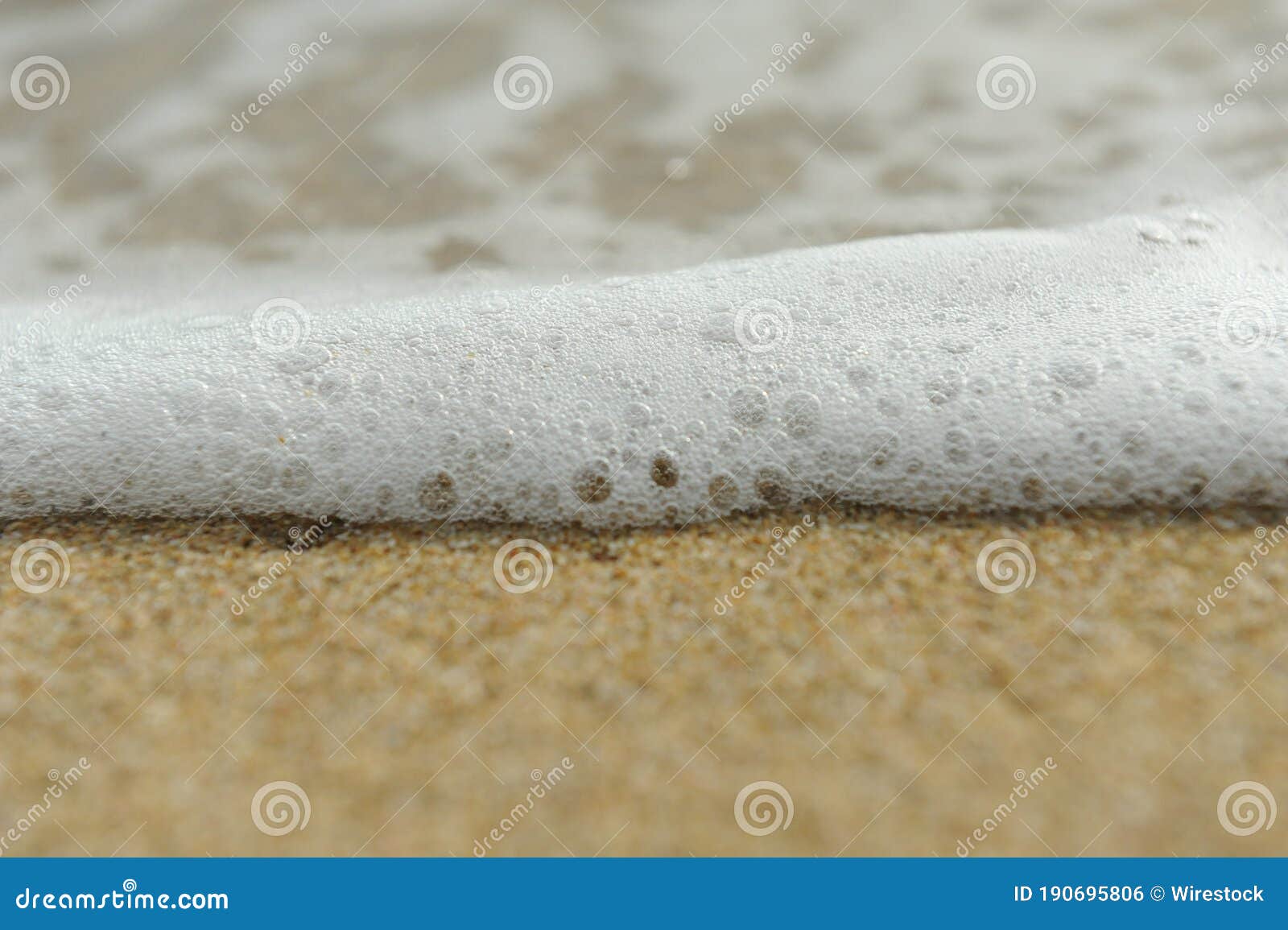 Closeup Shot of Bubbles in Sea Foam on Sand at a Beach Stock Photo ...