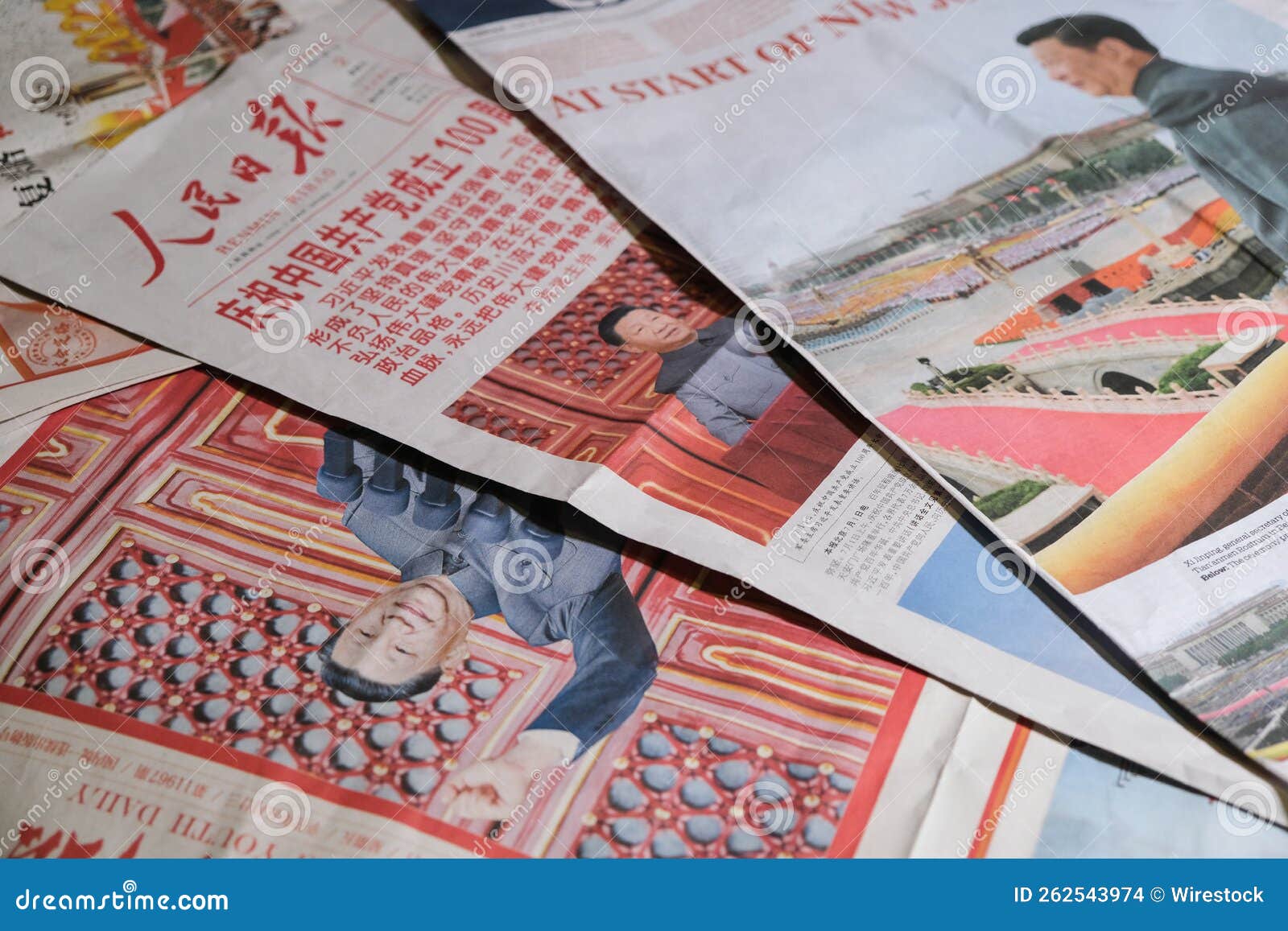 Closeup Shot of Chinese Newspapers Reporting the 100th Anniversary of ...