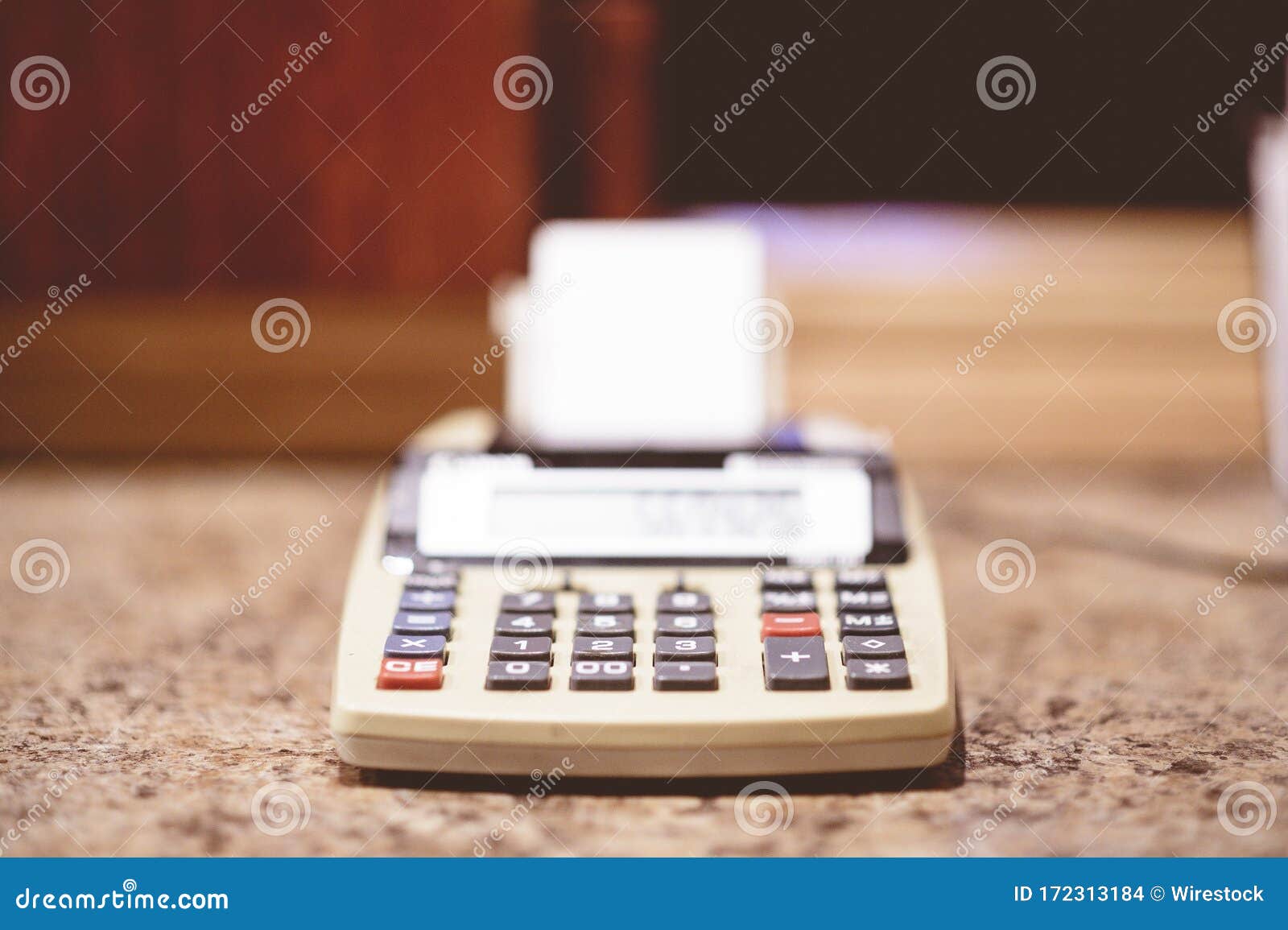 Closeup Shot of a Desktop Calculator with a Paper Tape Stock Photo ...