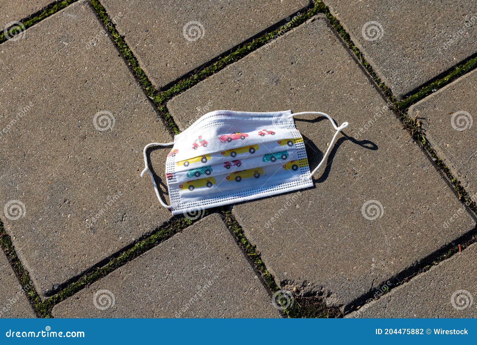 Closeup Shot of Dirty Face Mask on the Ground Stock Photo - Image of ...