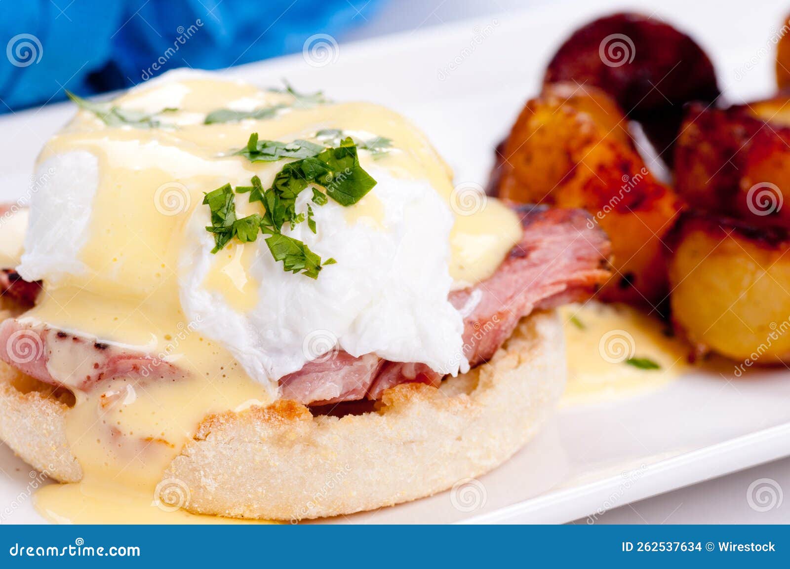 Closeup Shot of Eggs Benedict with Farm Fresh Eggs and Ham and Fried ...