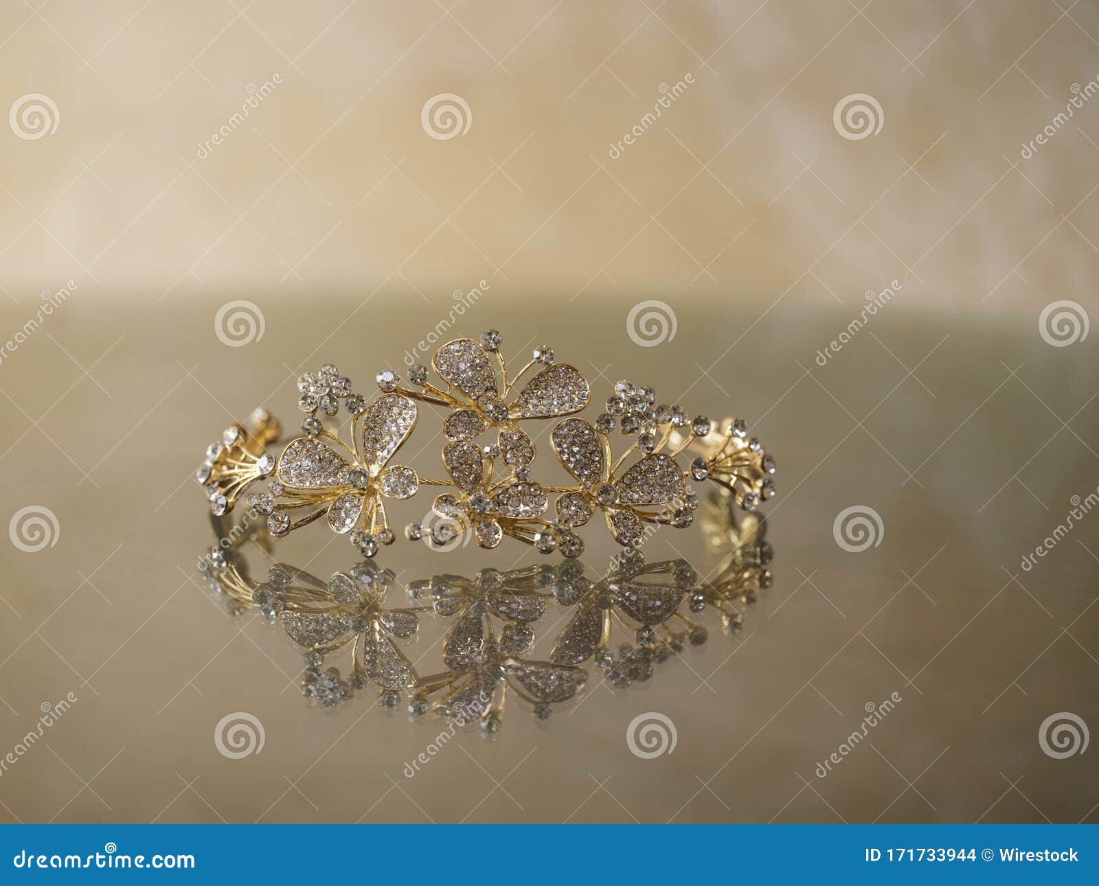 Closeup Shot of an Elegant Crown Reflected on the Glass Surface Below ...