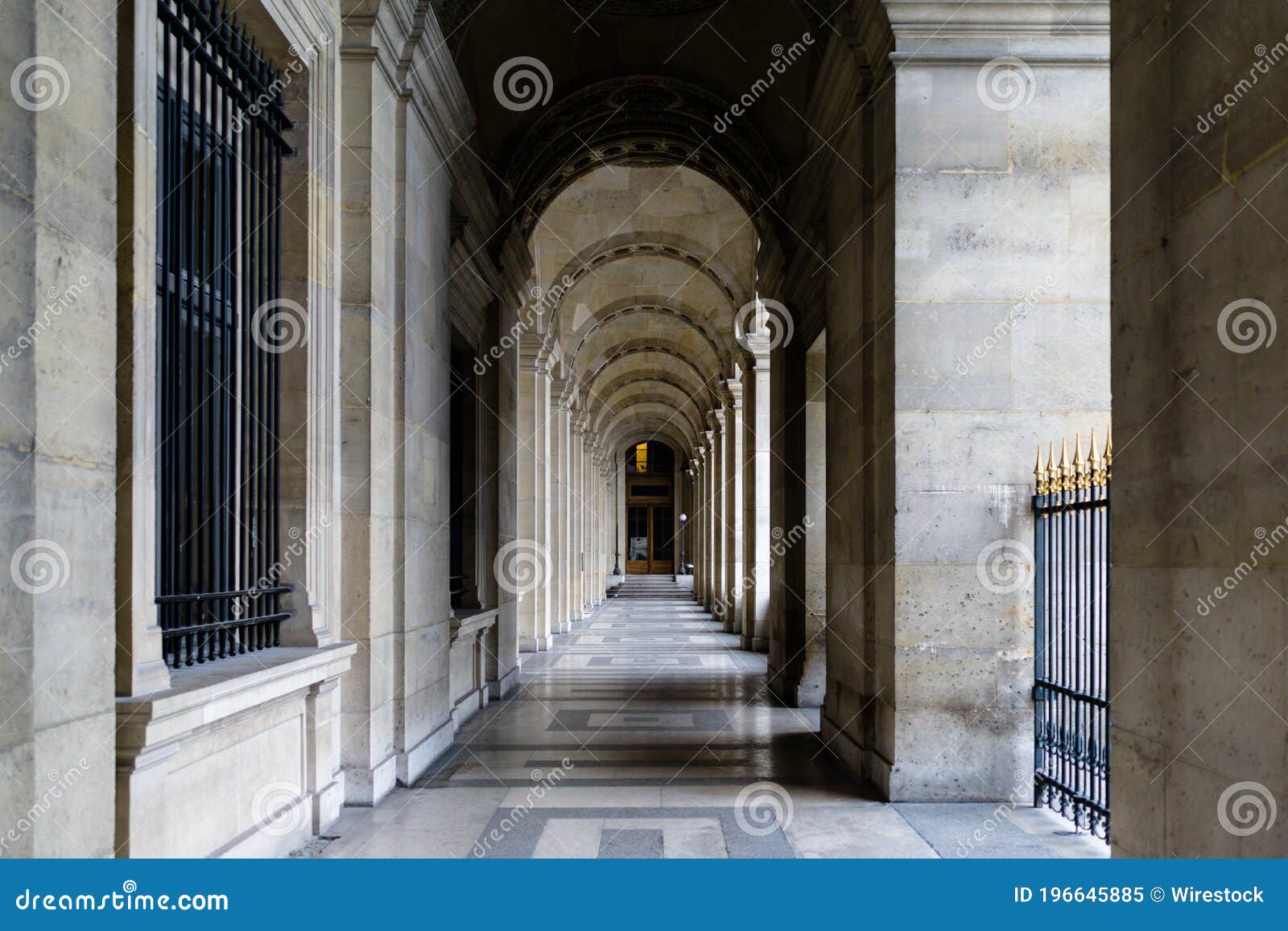 Closeup Shot of an External Corridor of Arcs of a Massive Building in ...
