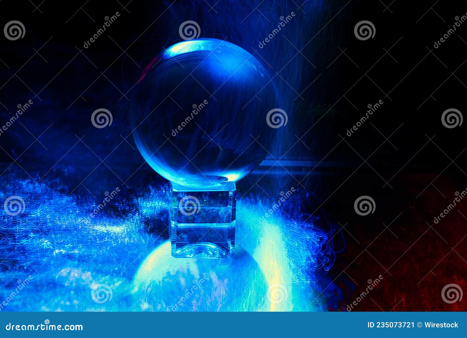 Closeup Shot of a Glowing Crystal Ball with Blue Lights on Dark ...