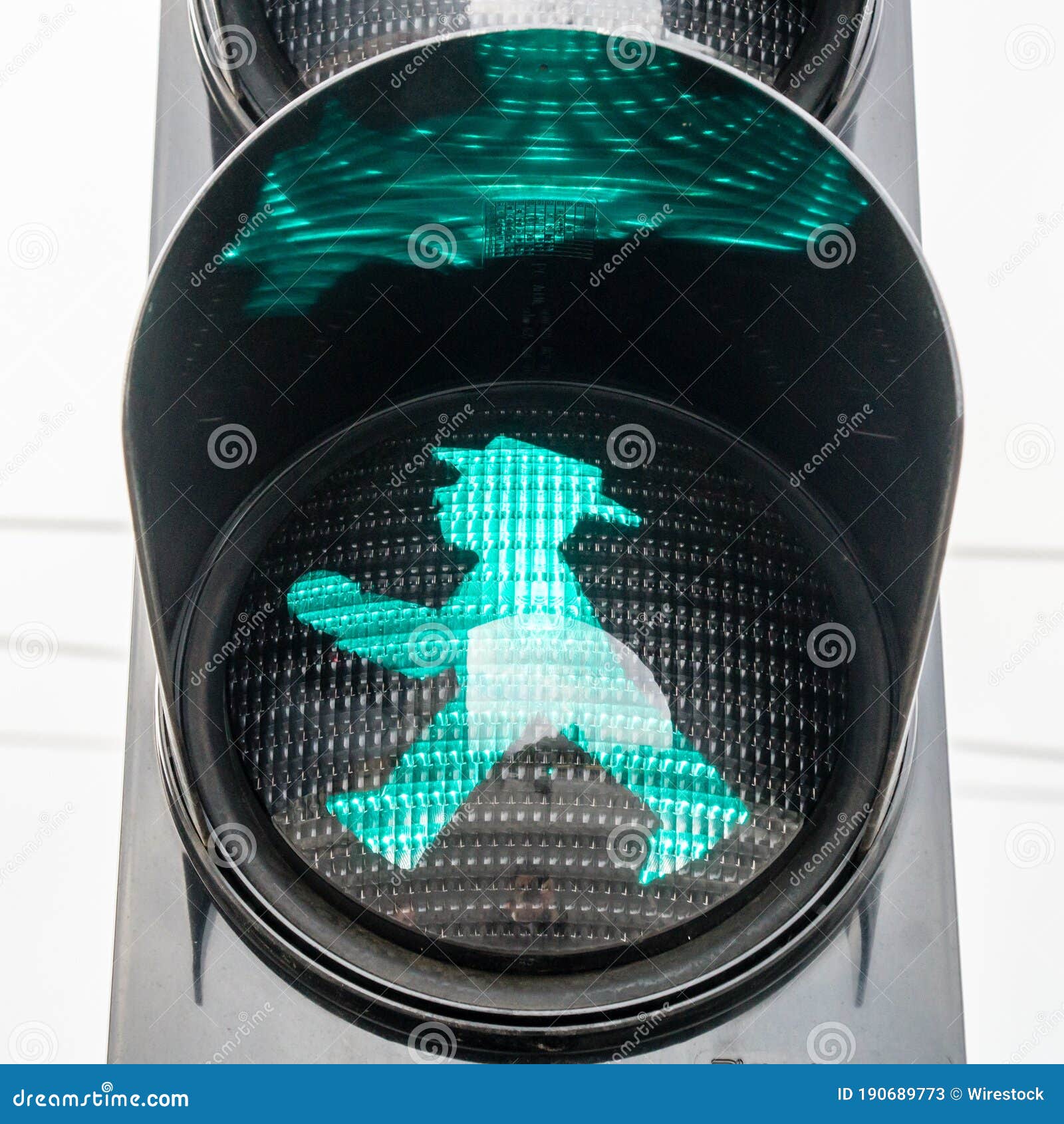 Closeup Shot of a Green Traffic Light with a Human Figure Stock Image ...