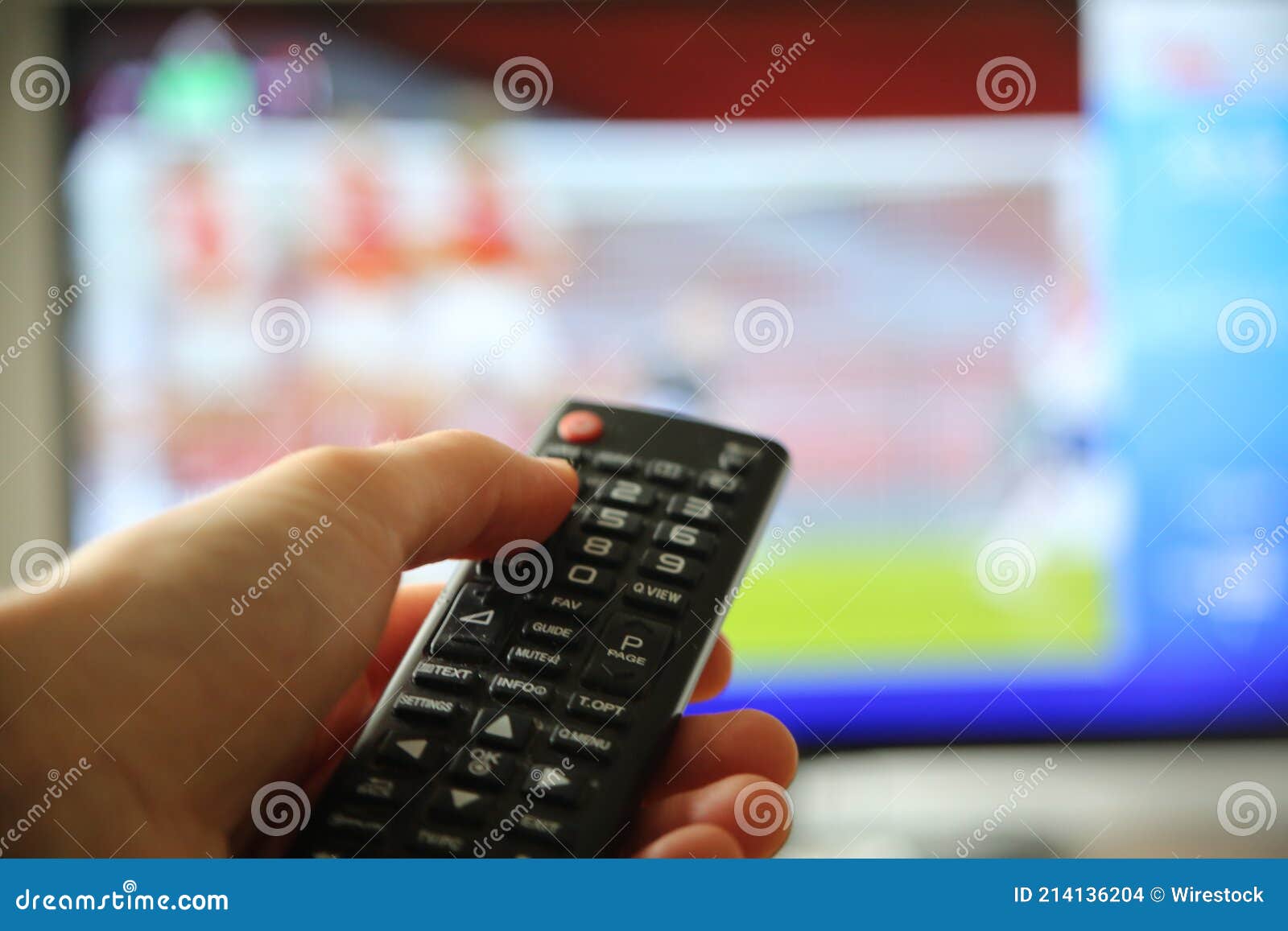 Closeup Shot of a Hand Holding the Remote Control Stock Photo - Image ...