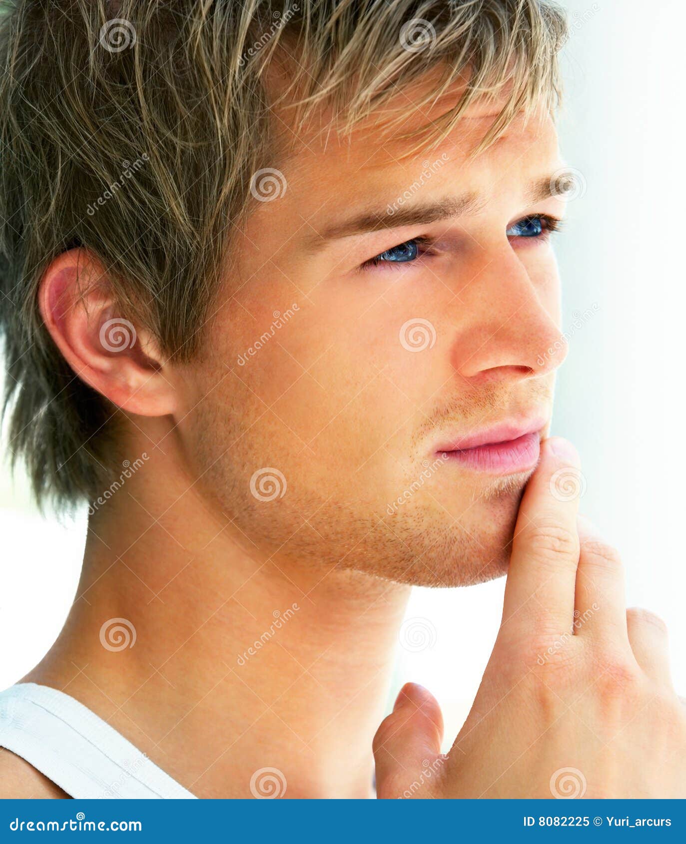 Closeup Shot of a Handsome Young Man Looking Away Stock Image - Image ...