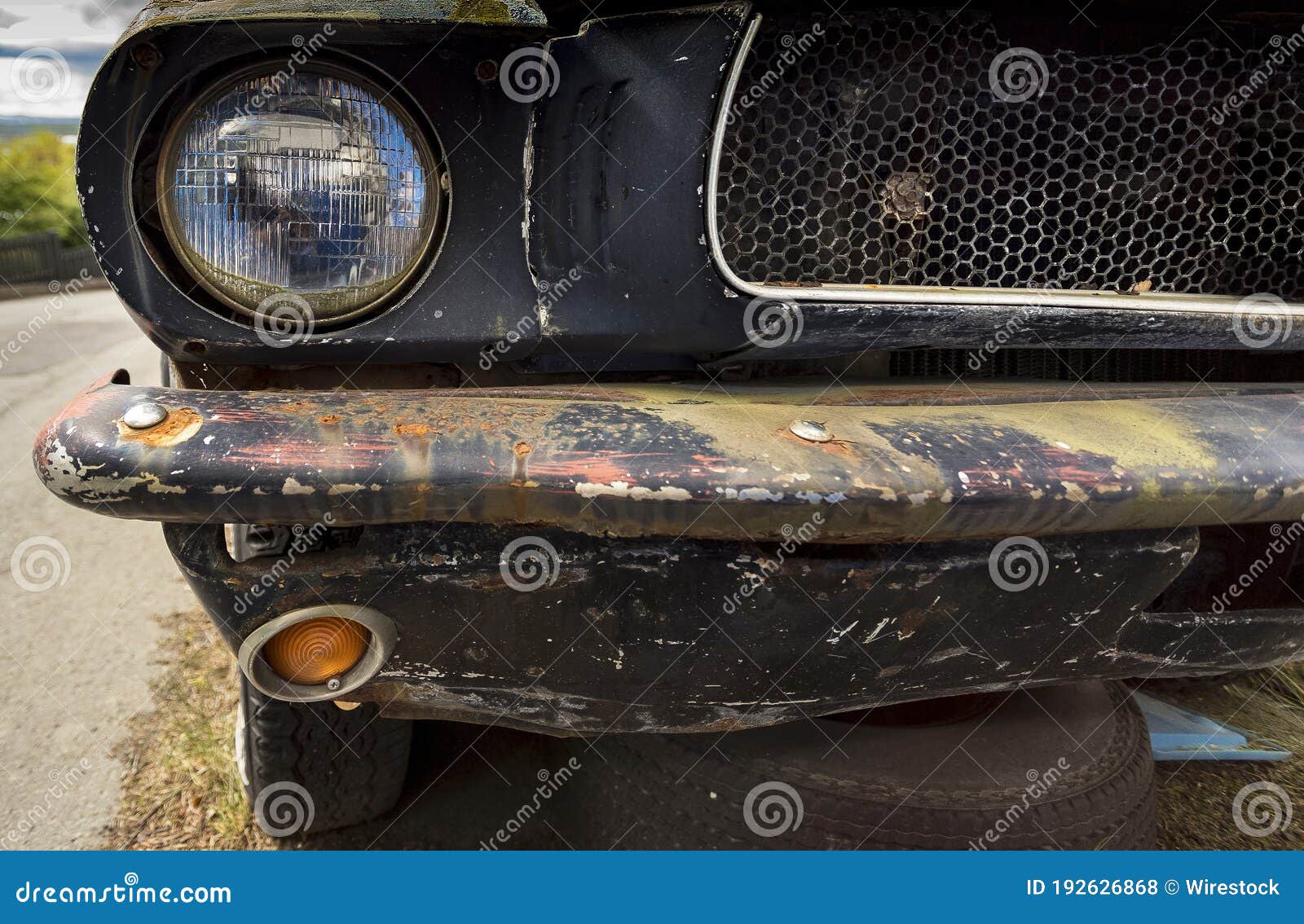 Closeup Shot of the Headlight of an Old Car with a Rusted Front Bumper ...