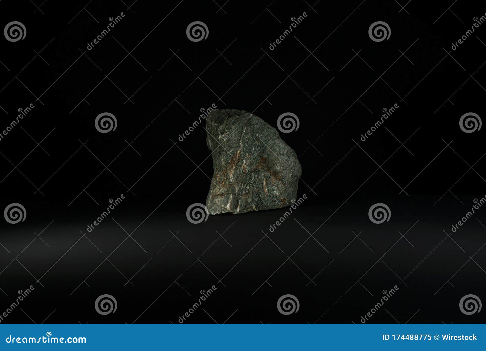 Closeup Shot of an Igneous Rock Isolated on a Black Background Stock ...
