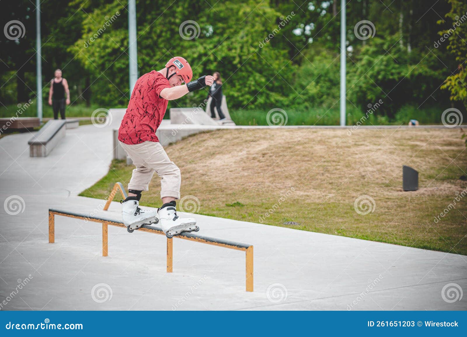 Closeup Shot of an Inline Skater in a Skating Rink Practicing Moves ...
