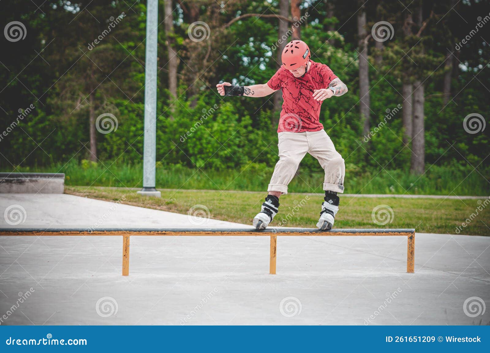 Closeup Shot of an Inline Skater in a Skating Rink Practicing Moves ...