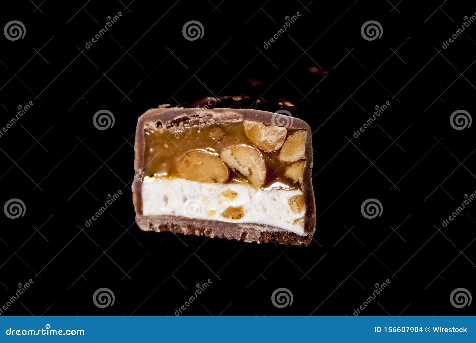 Closeup Shot of an Isolated Chocolate Bar Slice with Nuts and Cream on ...