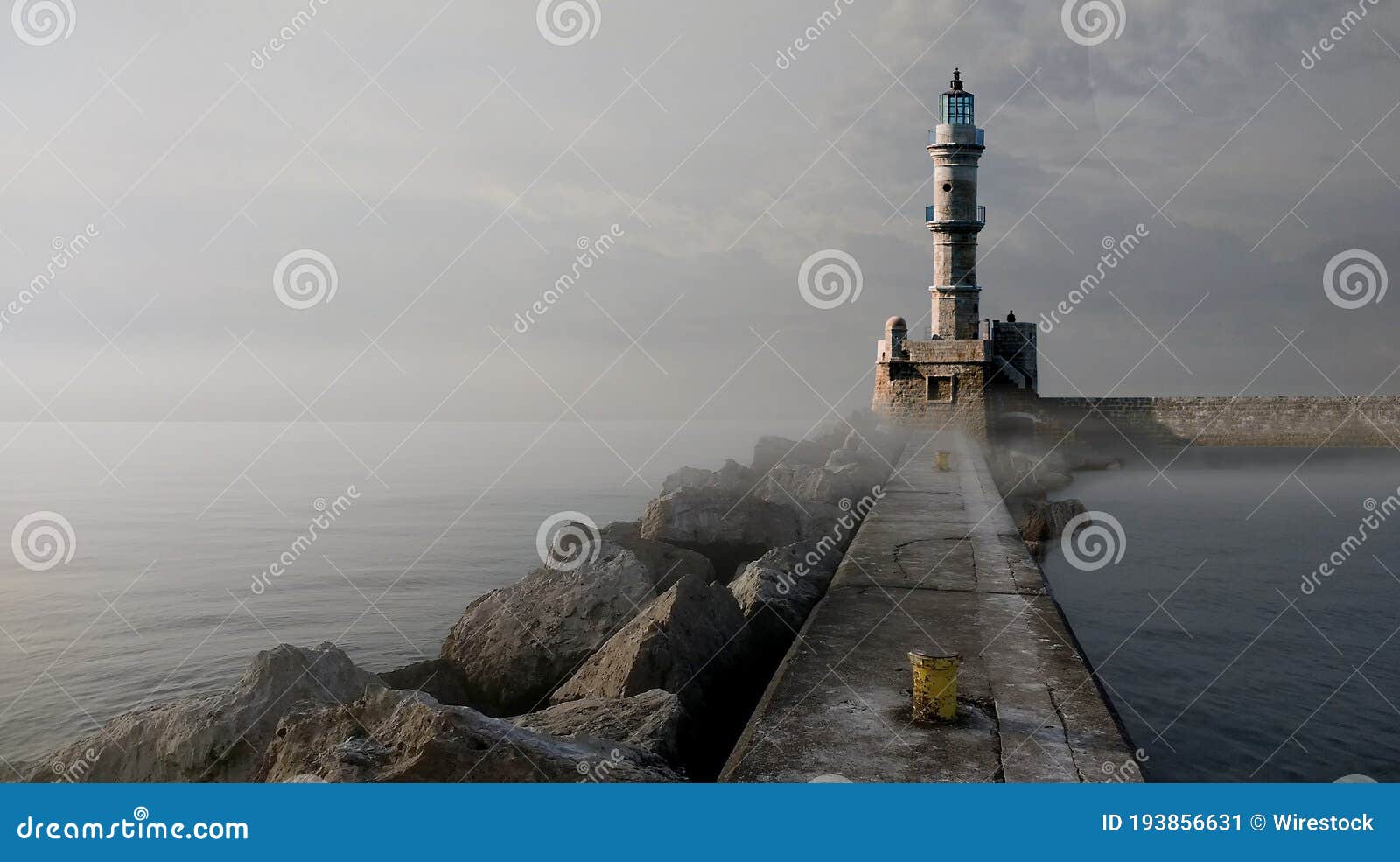 Closeup Shot of a Lighthouse on a Concrete Deck with Endless Sea on the ...