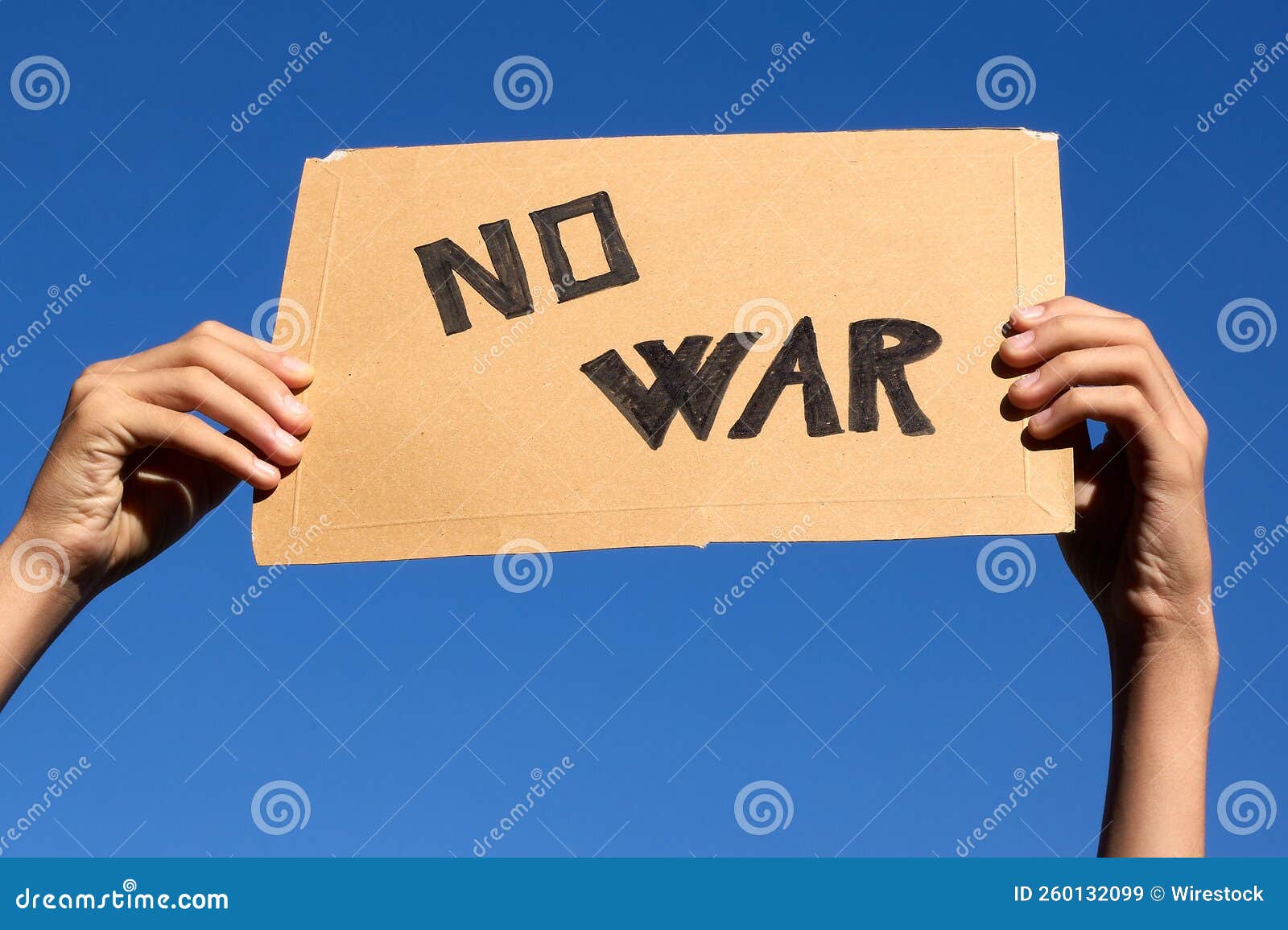 Closeup Shot of a No War Sign in Hands Under the Clear Sky Stock Image ...