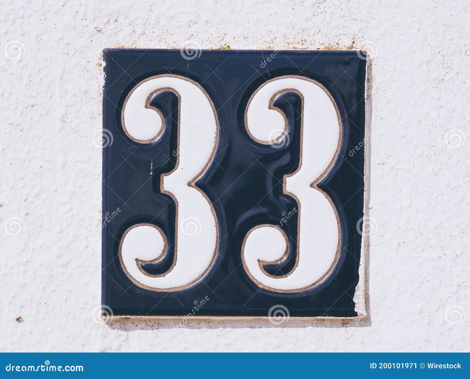 Closeup Shot of a Number 33 House Sign Stock Image - Image of three ...