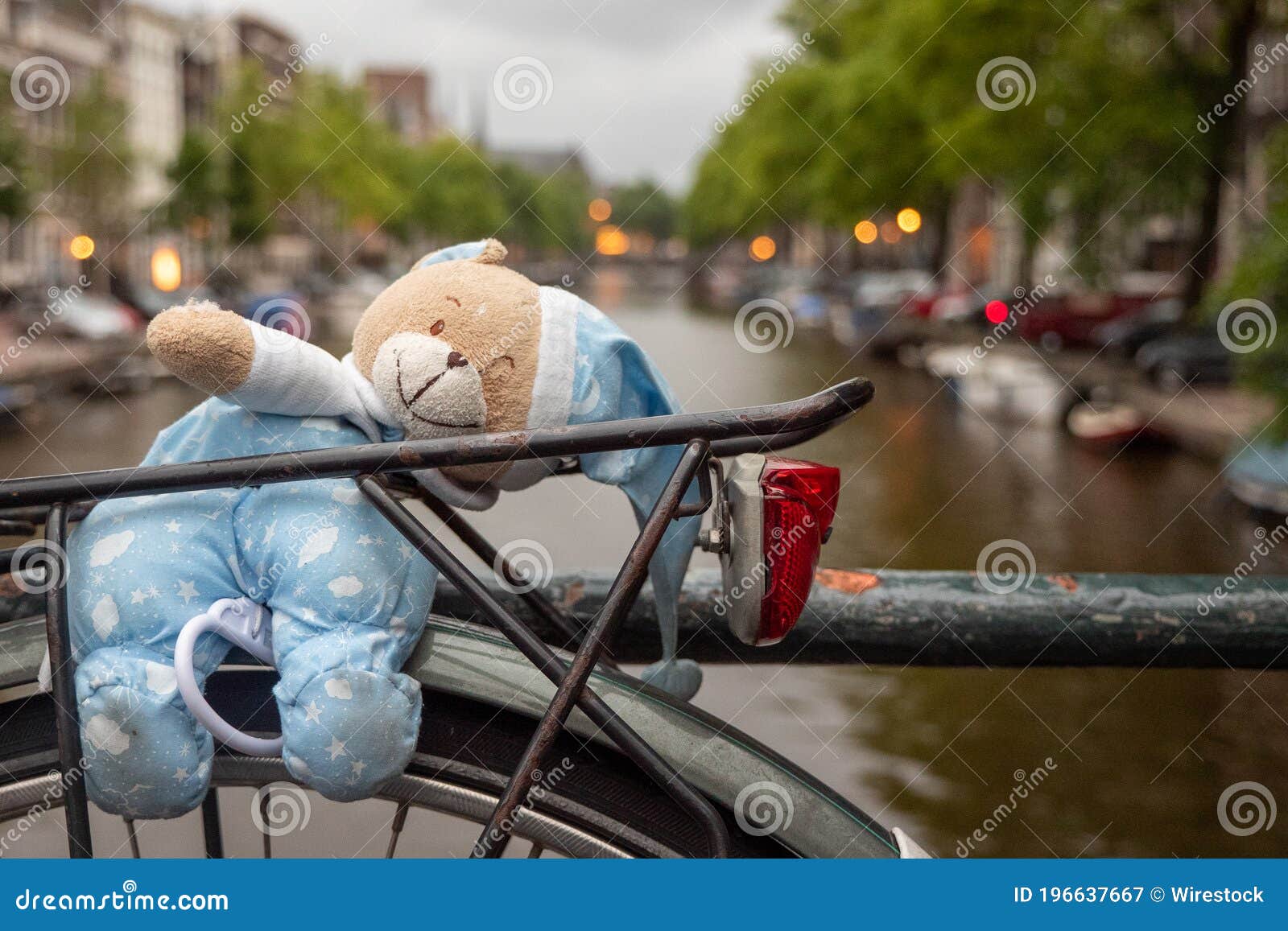 Closeup Shot of an Old Bicycle with a Teddy Bear on the Bridge Stock ...