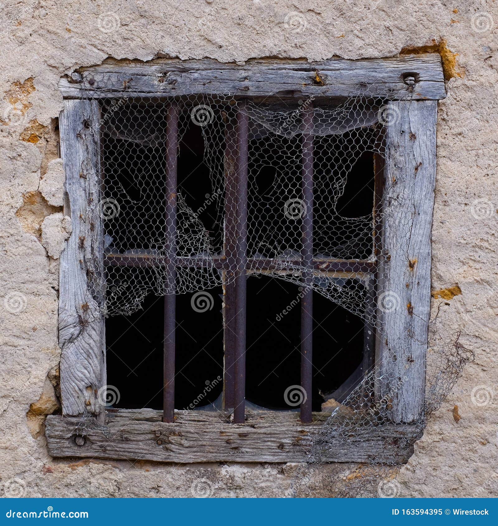 Closeup Shot of an Old Broken Window Covered in Net with Holes Stock ...
