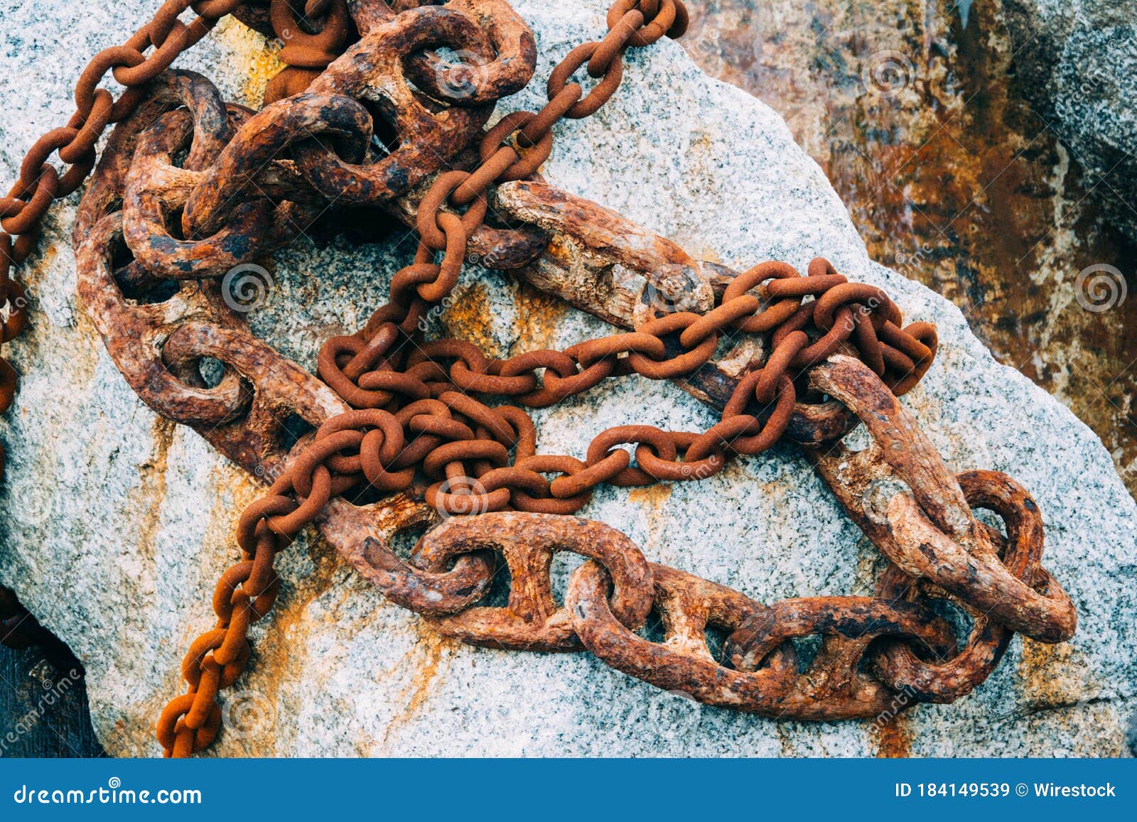 Closeup Shot of an Old Rusty Chains Placed on the Rock Stock Image ...