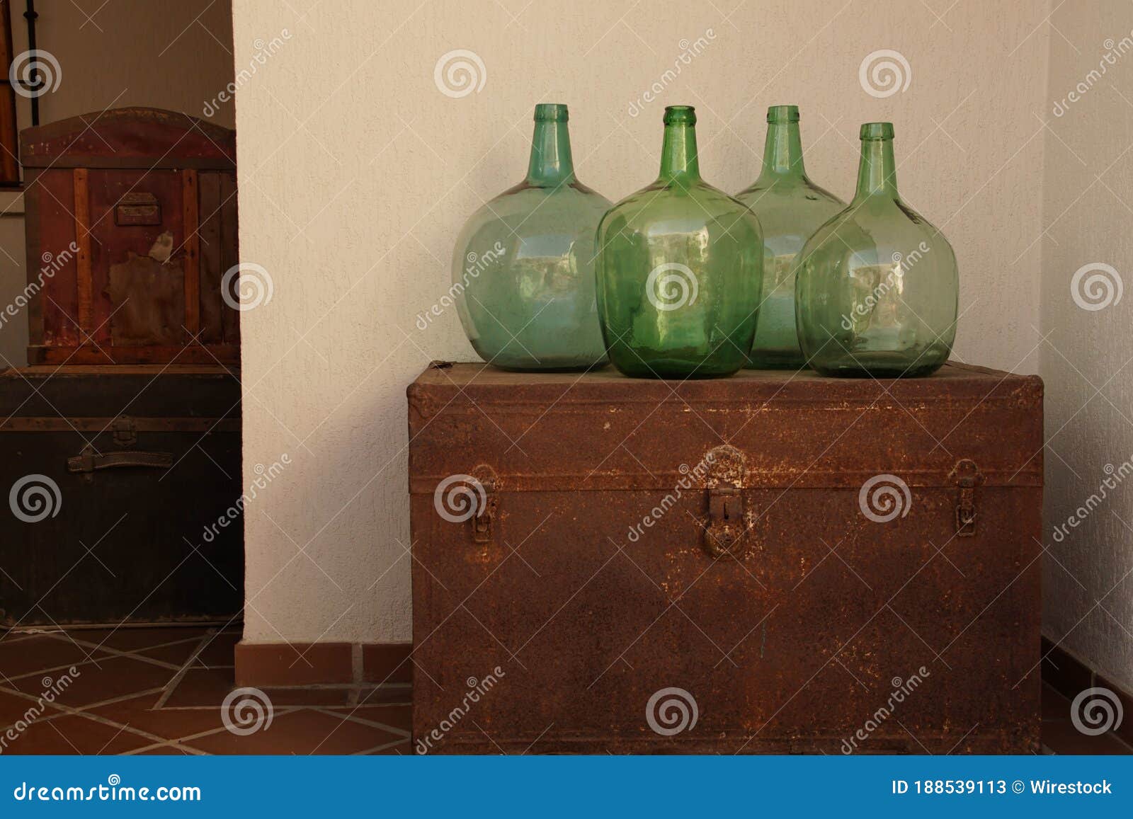 Closeup Shot of an Old Rusty Chest with Empty Alcohol Bottles on it ...