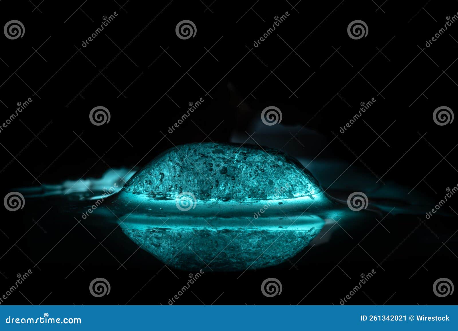 Closeup Shot of a Piece of Ice Melting in the Water Stock Image - Image ...