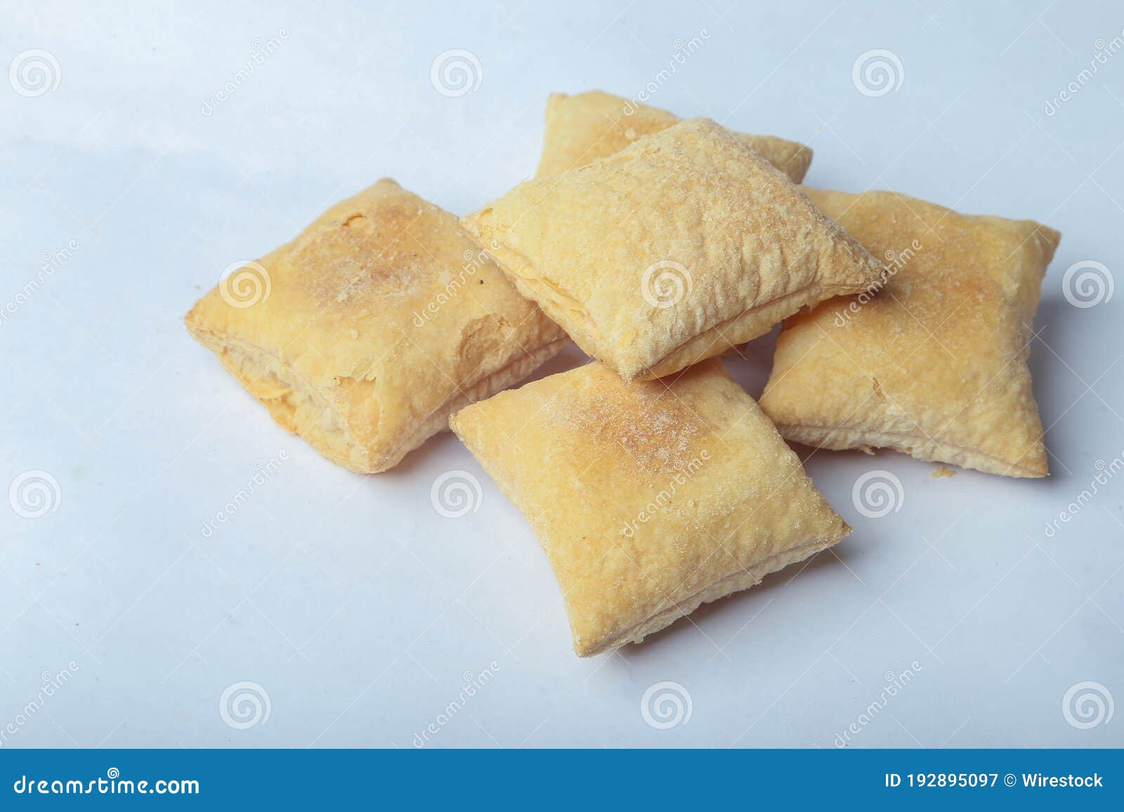 Closeup Shot of a Pile of Square Puff Biscuits on a White Surface Stock ...