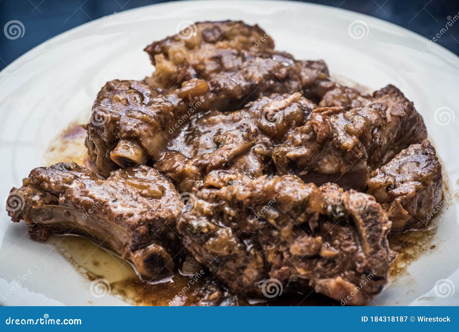 Closeup Shot of a Plate with Mouthwatering Cooked Greasy Beef Stock ...