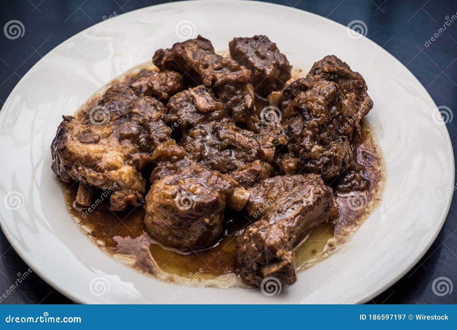 Closeup Shot of a Plate with Mouthwatering Cooked Greasy Beef Stock ...