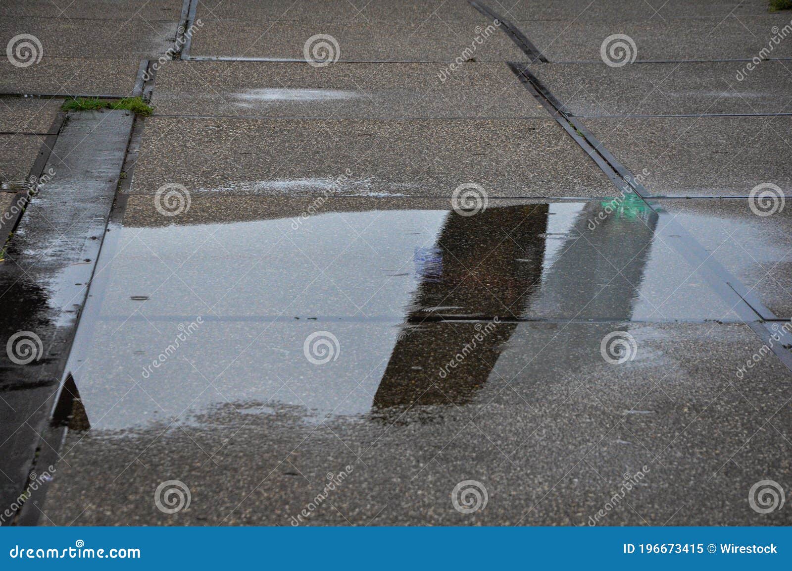 Closeup Shot of a Puddle on the Asphalt Stock Image - Image of city ...