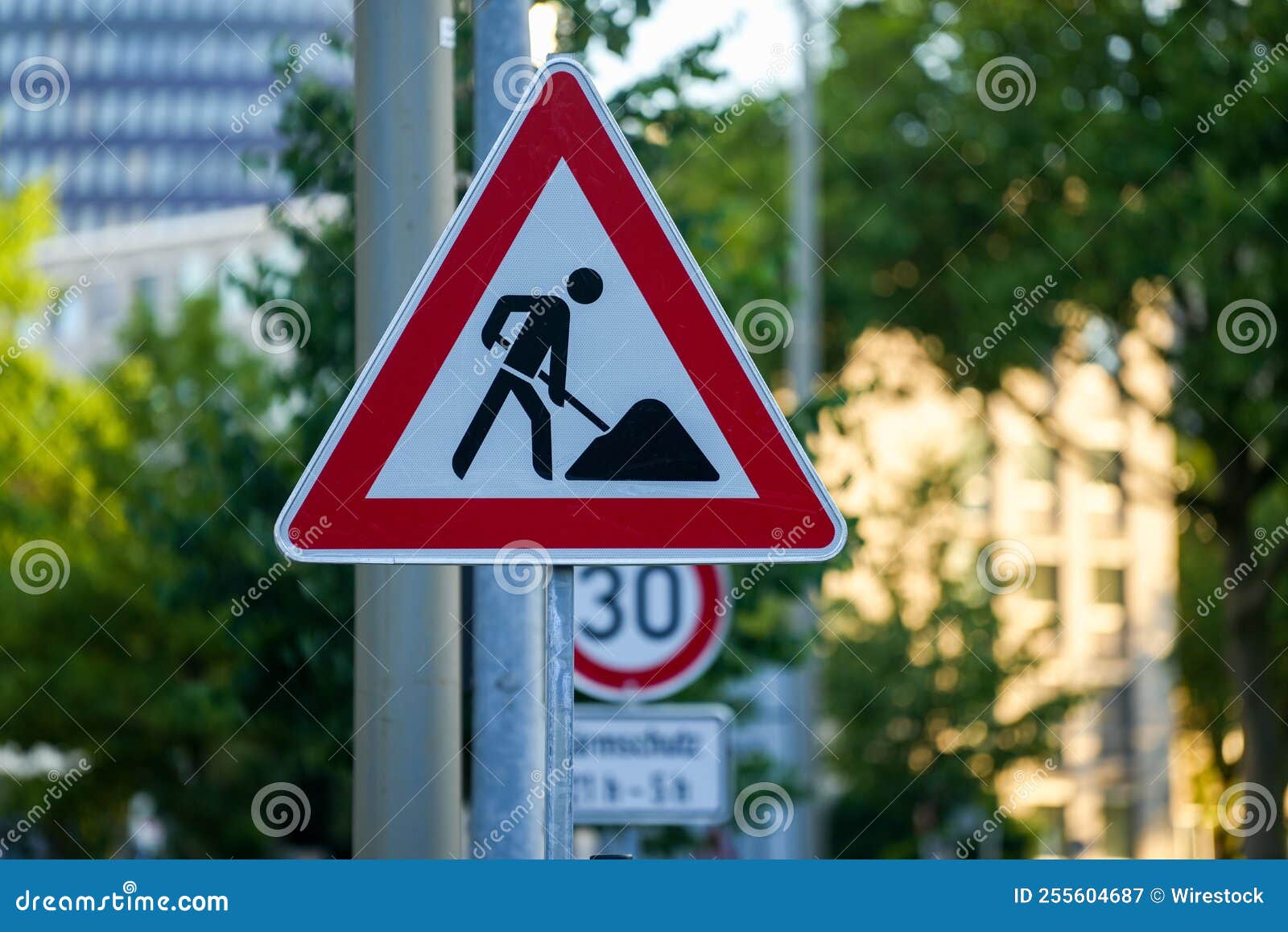 Triangular Traffic Sign, Which Over The Years Has Grown Together With A ...