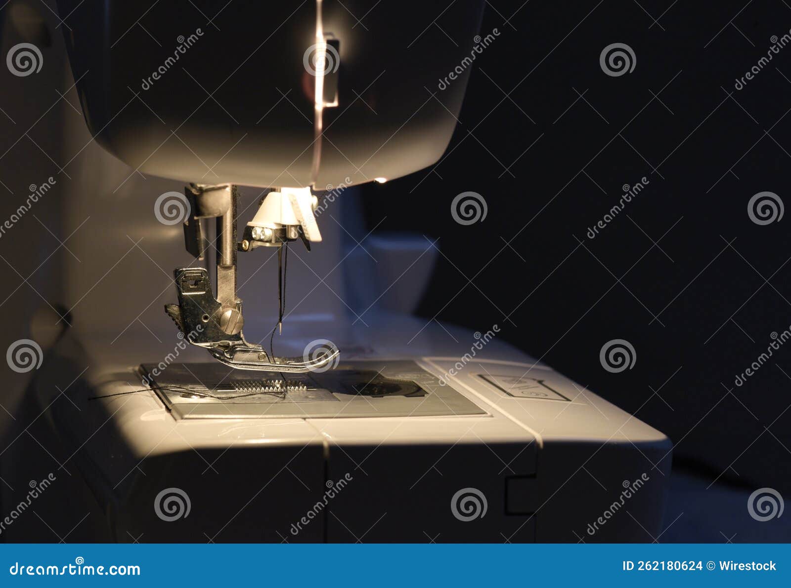 Closeup Shot of a Sewing Machine with Light on a Stock Photo - Image of ...