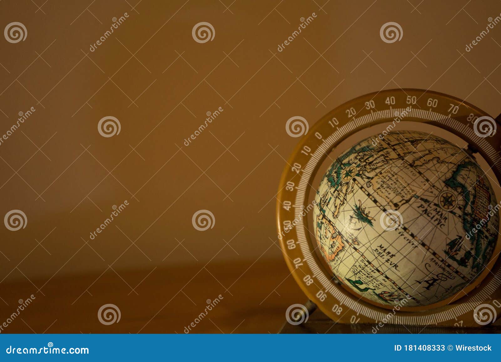 Closeup Shot of a Spinning Globe on a Beige Background Stock Image ...