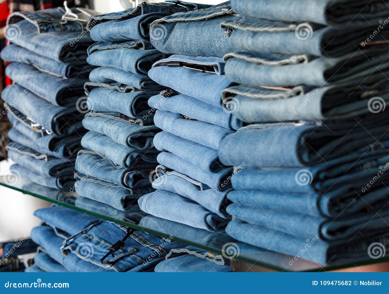 Closeup Shot of Stack of Folded Jeans Stock Photo - Image of boutique ...