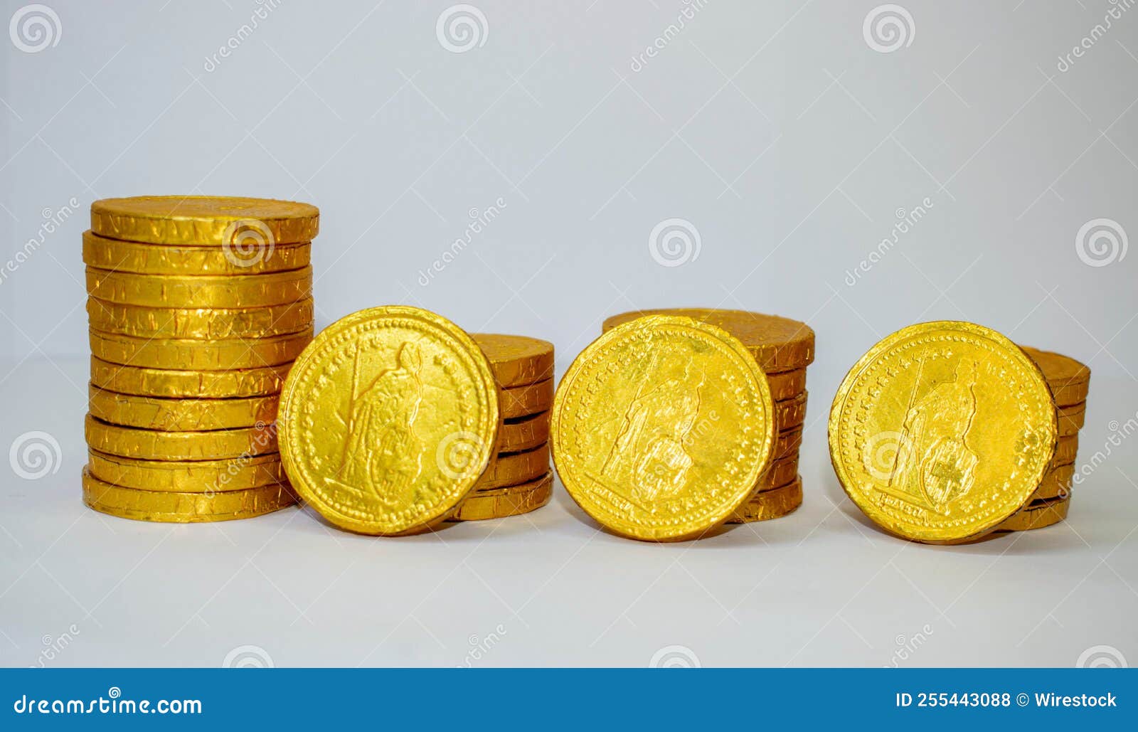 Closeup Shot of Stacks of Gold Coins Isolated on a White Background ...