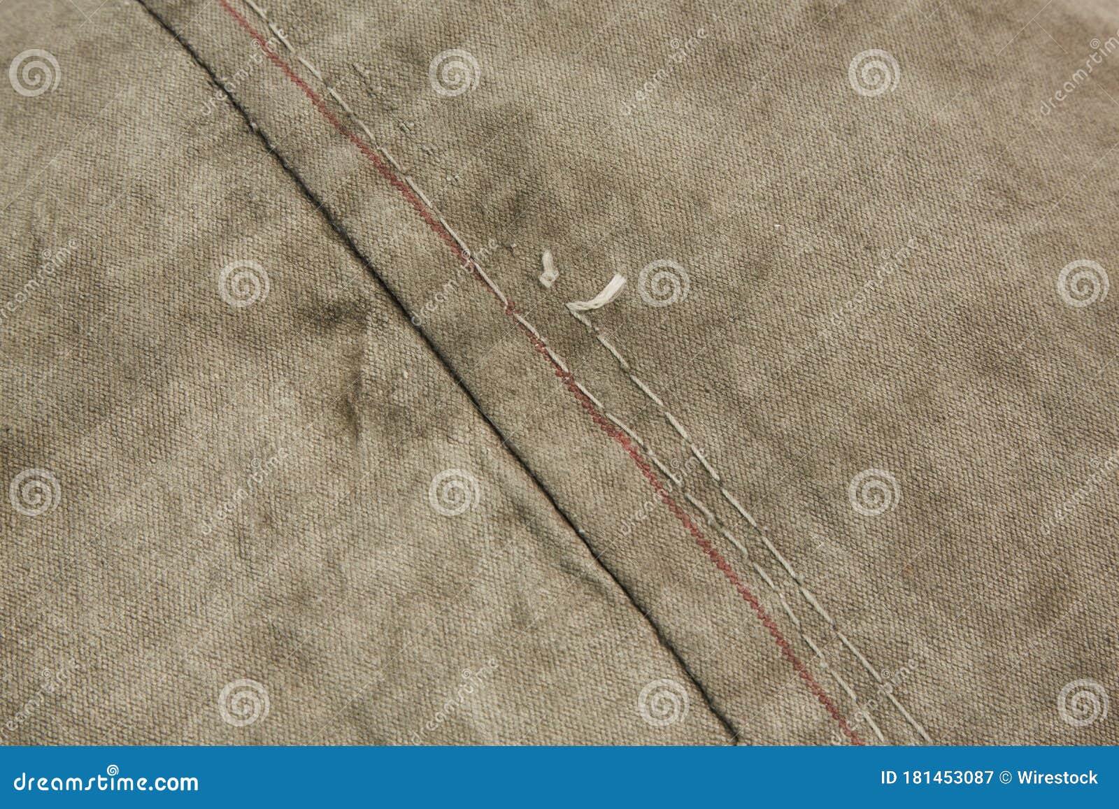 Closeup Shot of a Stitch with White Thread on a Brown Textile Stock ...