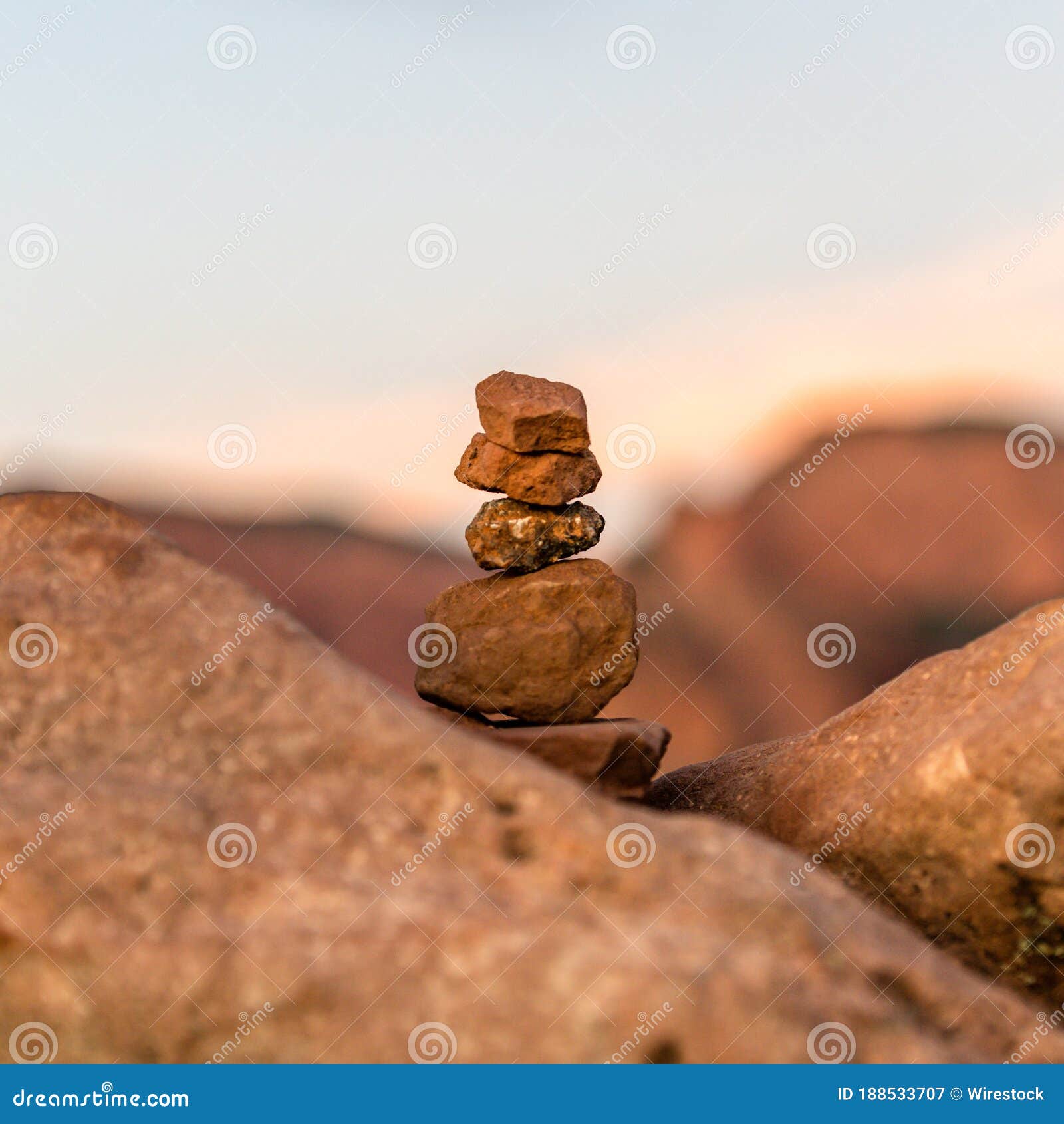 Closeup Shot of Tiny Stones in a Small Cairn Surrounded by Rocks - the ...
