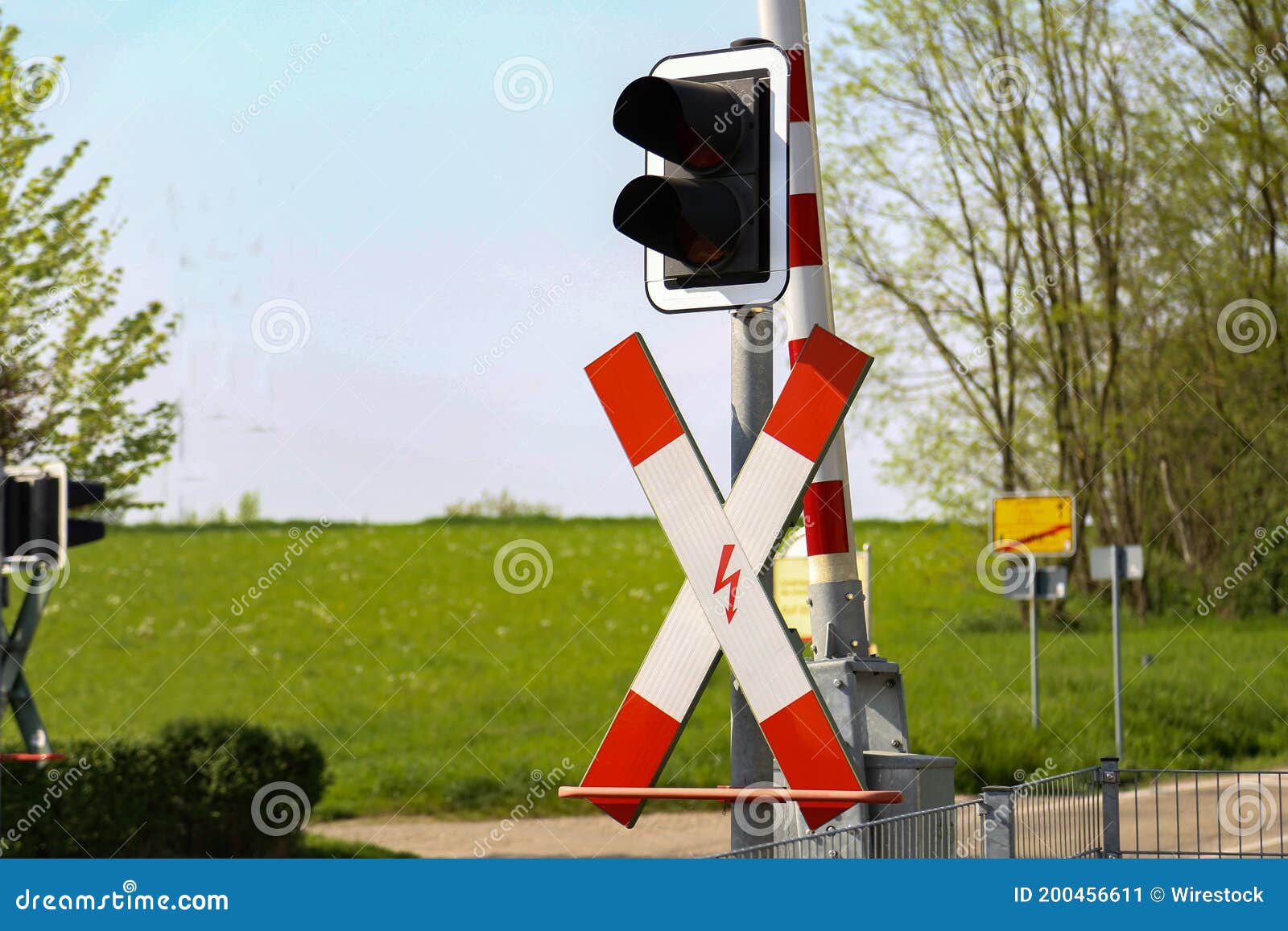 Closeup Shot of a Train Stop Sign Stock Image - Image of closeup, grass ...