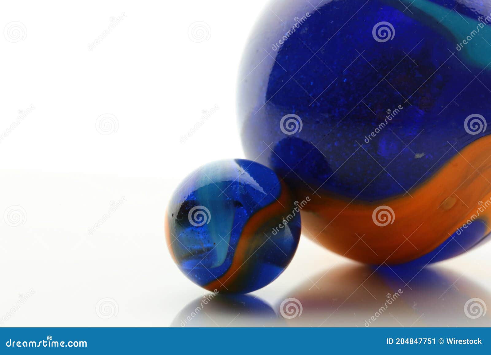 Closeup Shot of Two Big and Small Balls with Colorful Textures on a ...