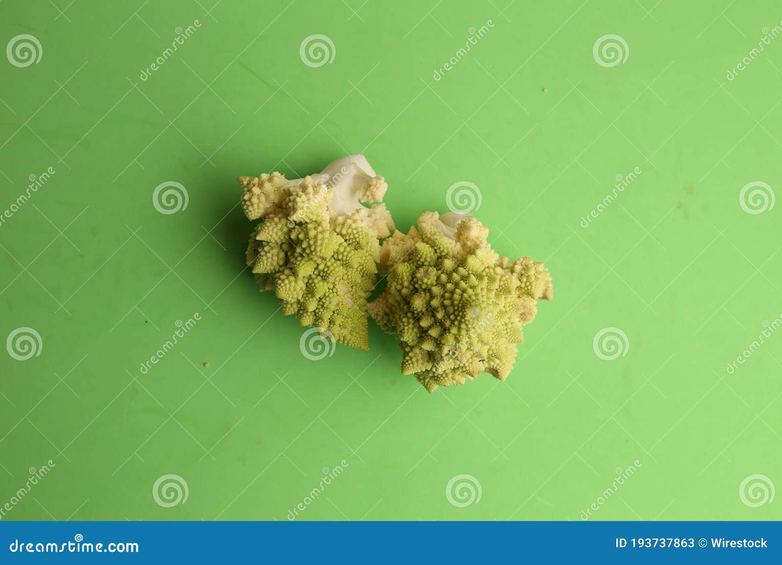 Closeup Shot of Two Pieces of Romanesco Vegetable in Color Background ...
