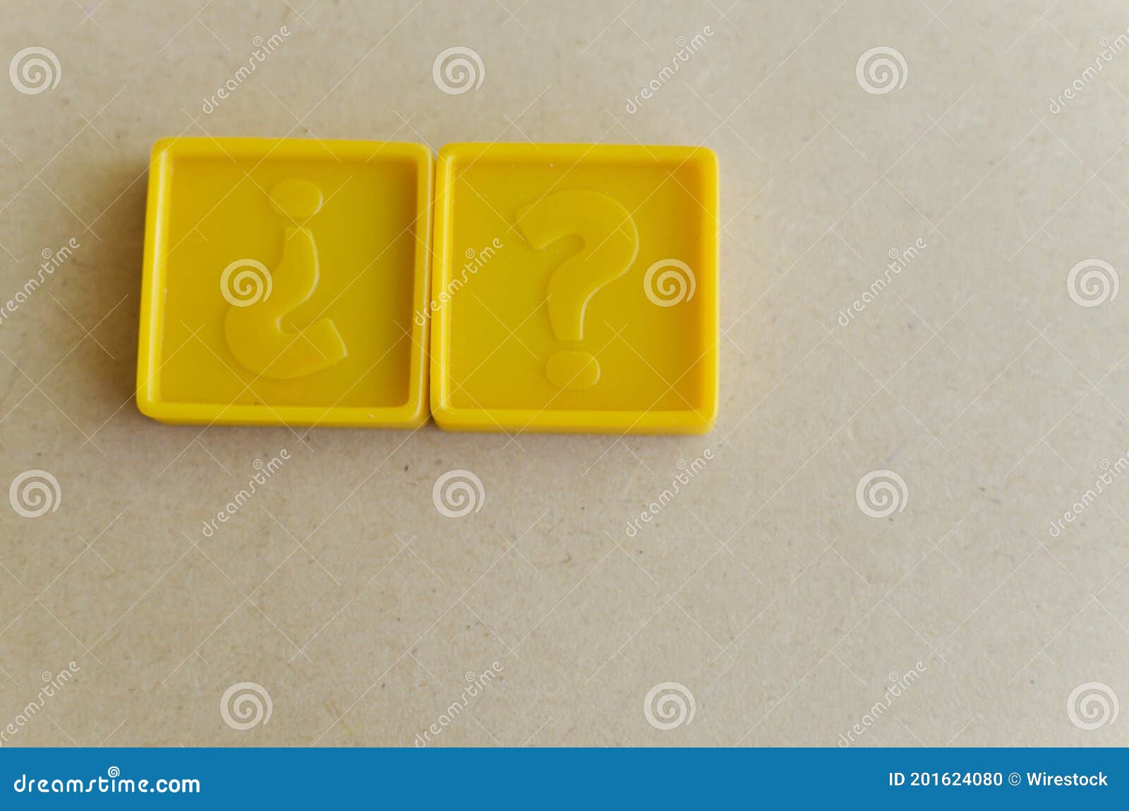 Closeup Shot of Two Yellow Chips with Question Marks Stock Photo ...