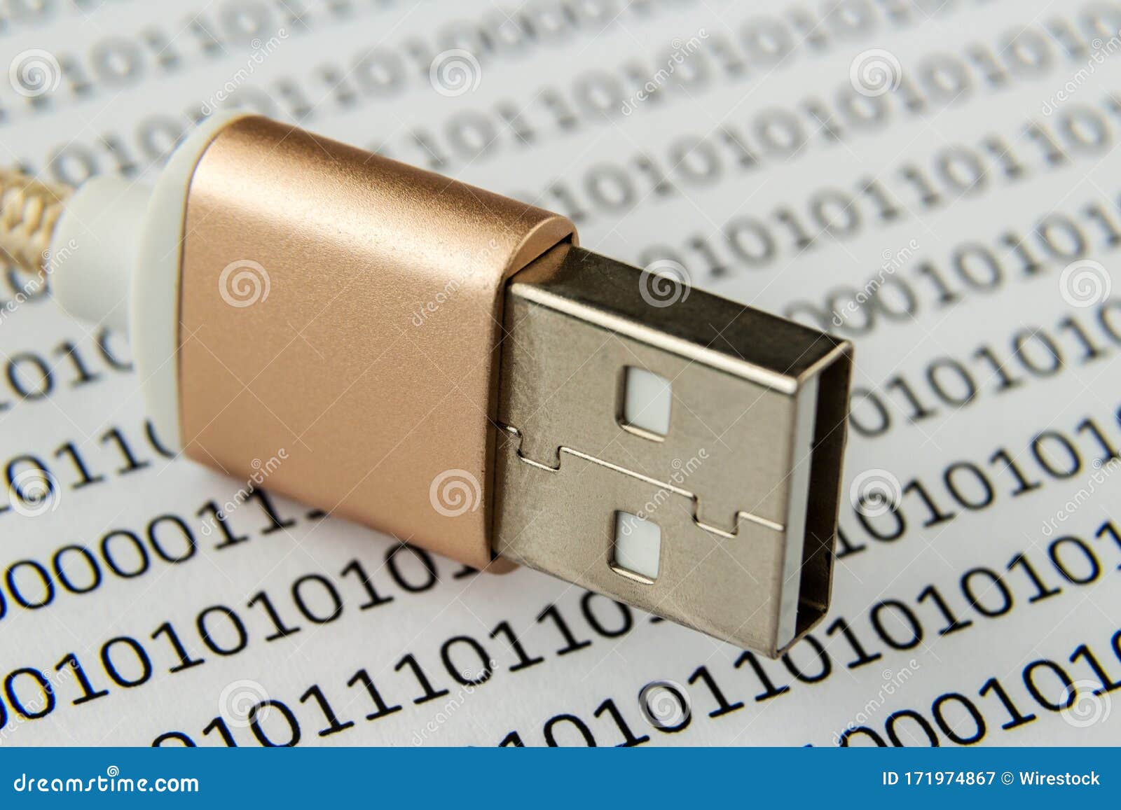 Closeup Shot of a USB Cable on a Piece of Paper with Numbers and Codes ...