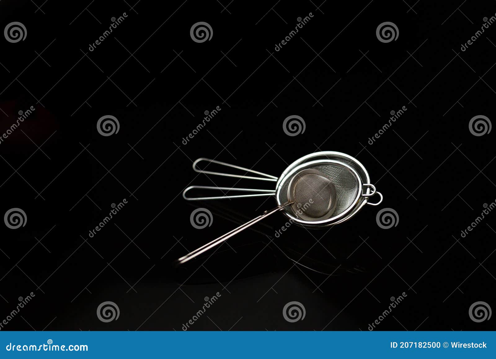 Closeup Shot of Various Silver Sieves on Black Background Stock Photo ...